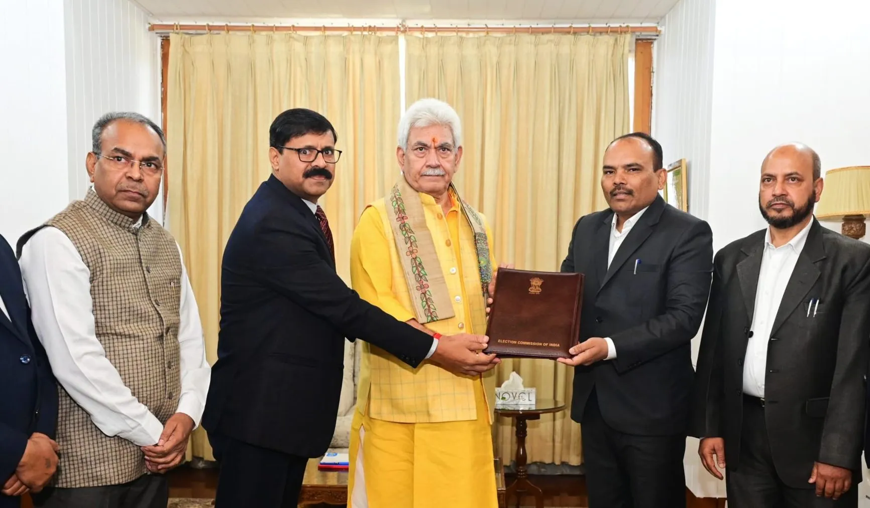 J&K CEO Pole meets LG Sinha, submits list of newly elected members of ...