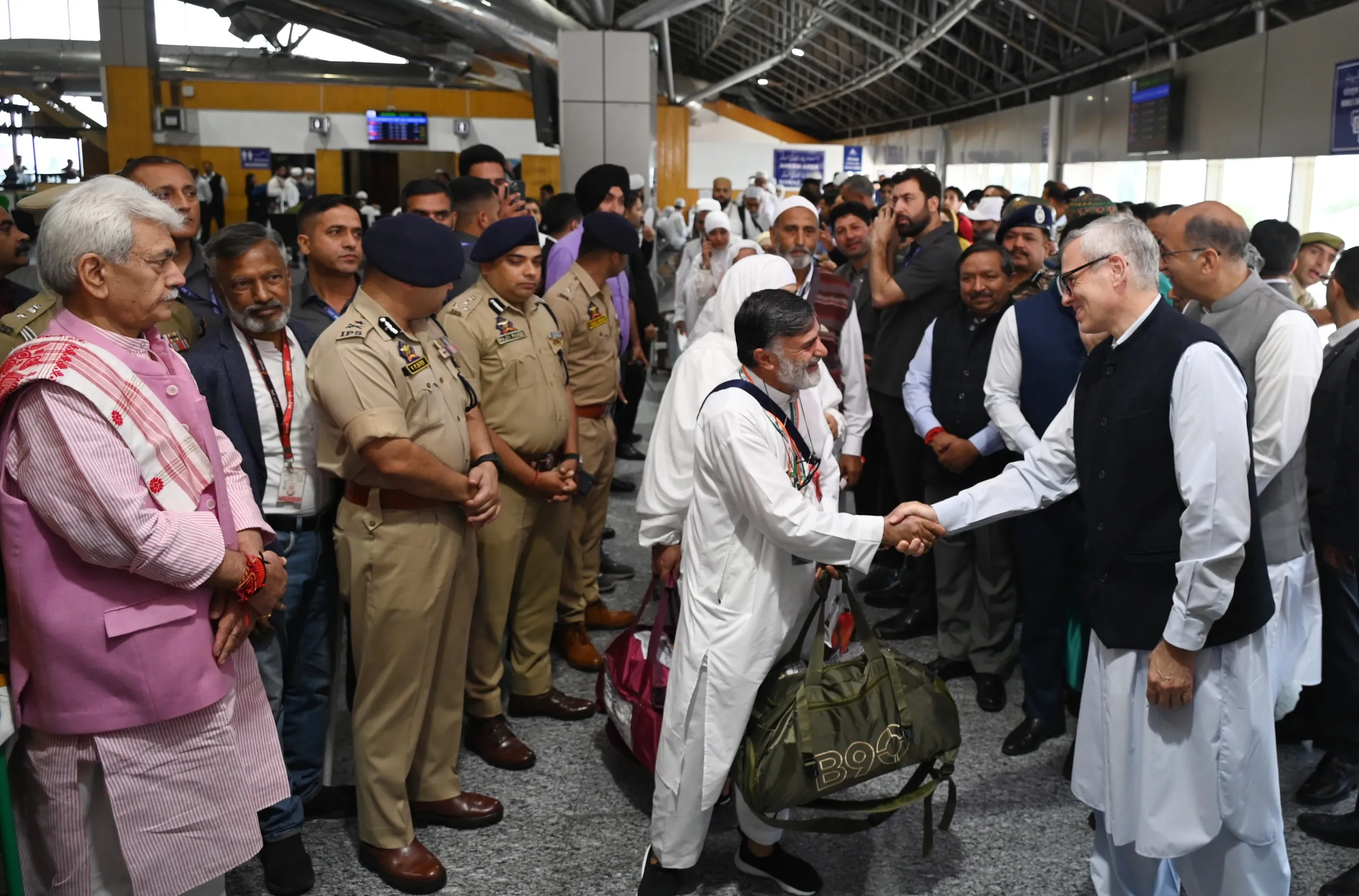 CM Omar Abdullah bids farewell to first batch of Haj pilgrims at Srinagar Airport