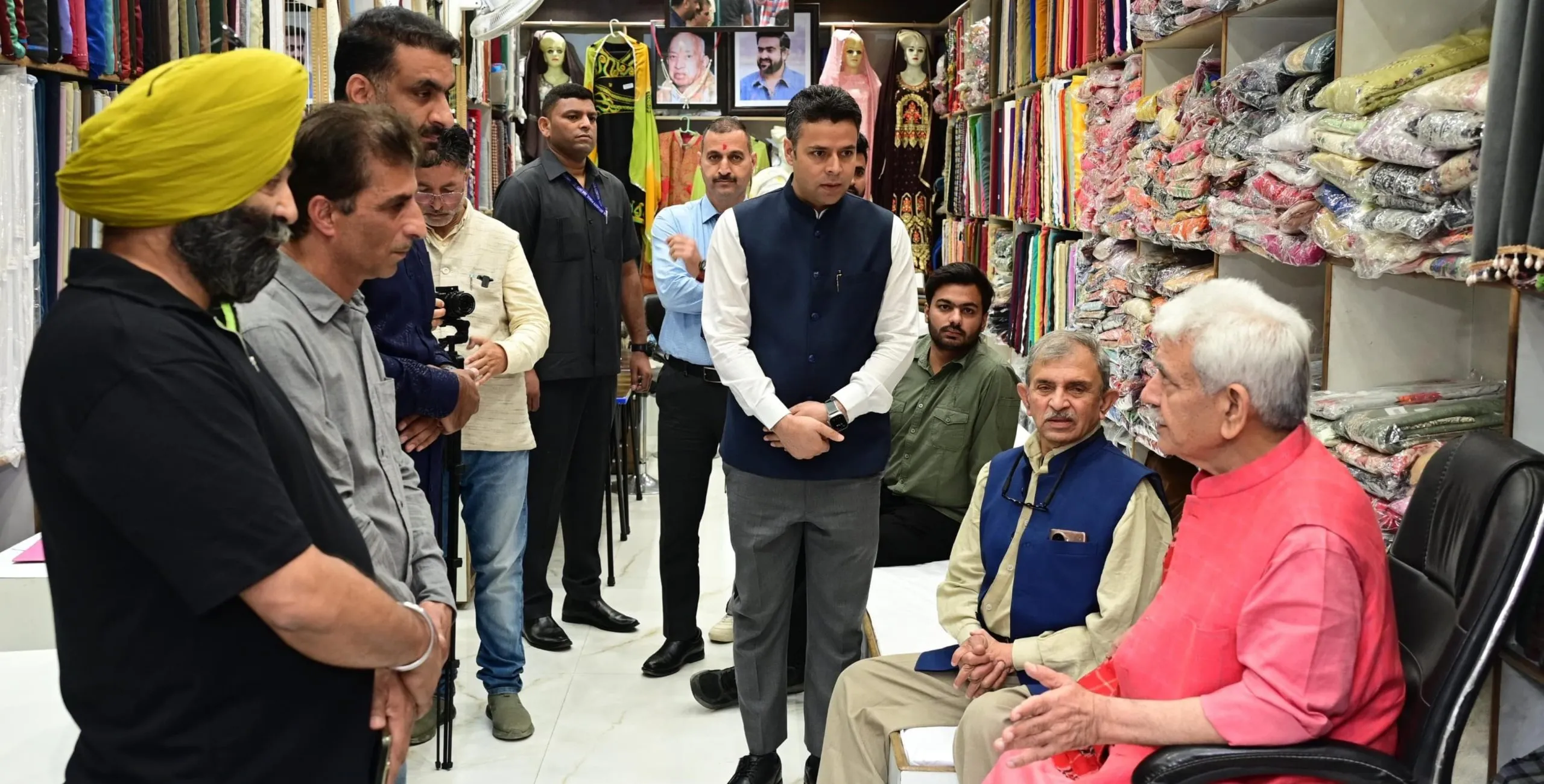 LG interacts with traders at Lal Chowk Srinagar